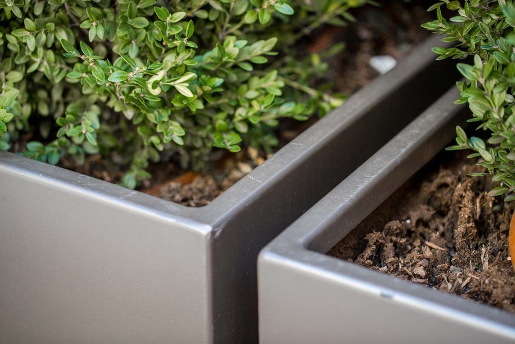 Impact of Outdoor Planter Material | PlanterCraft
